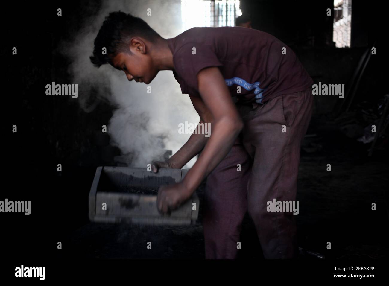 A children worker during work at ship building yard near the river Buriganga in Dhaka ...