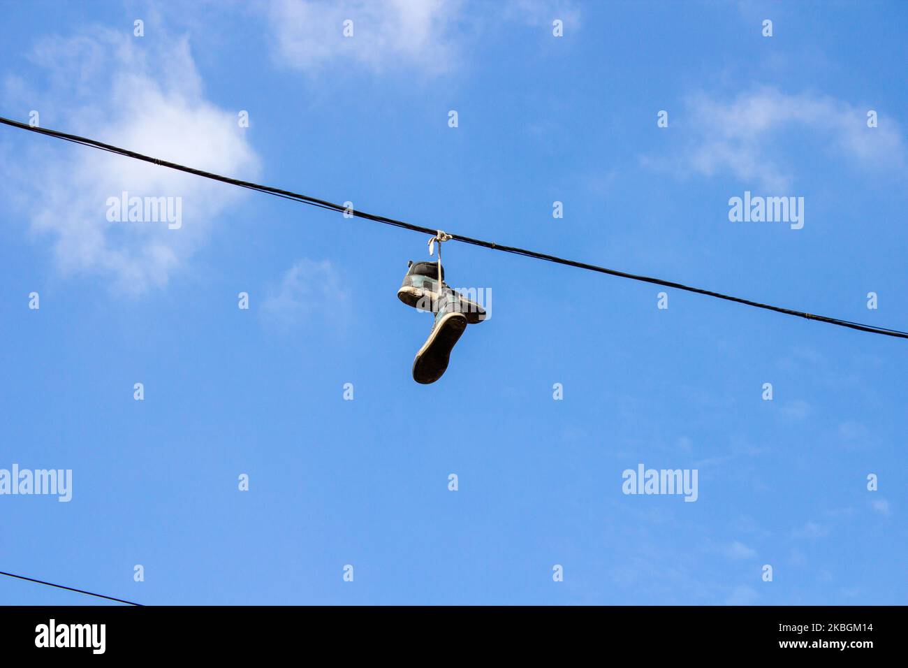 Dangling on a telephone wire hi-res stock photography and images - Alamy