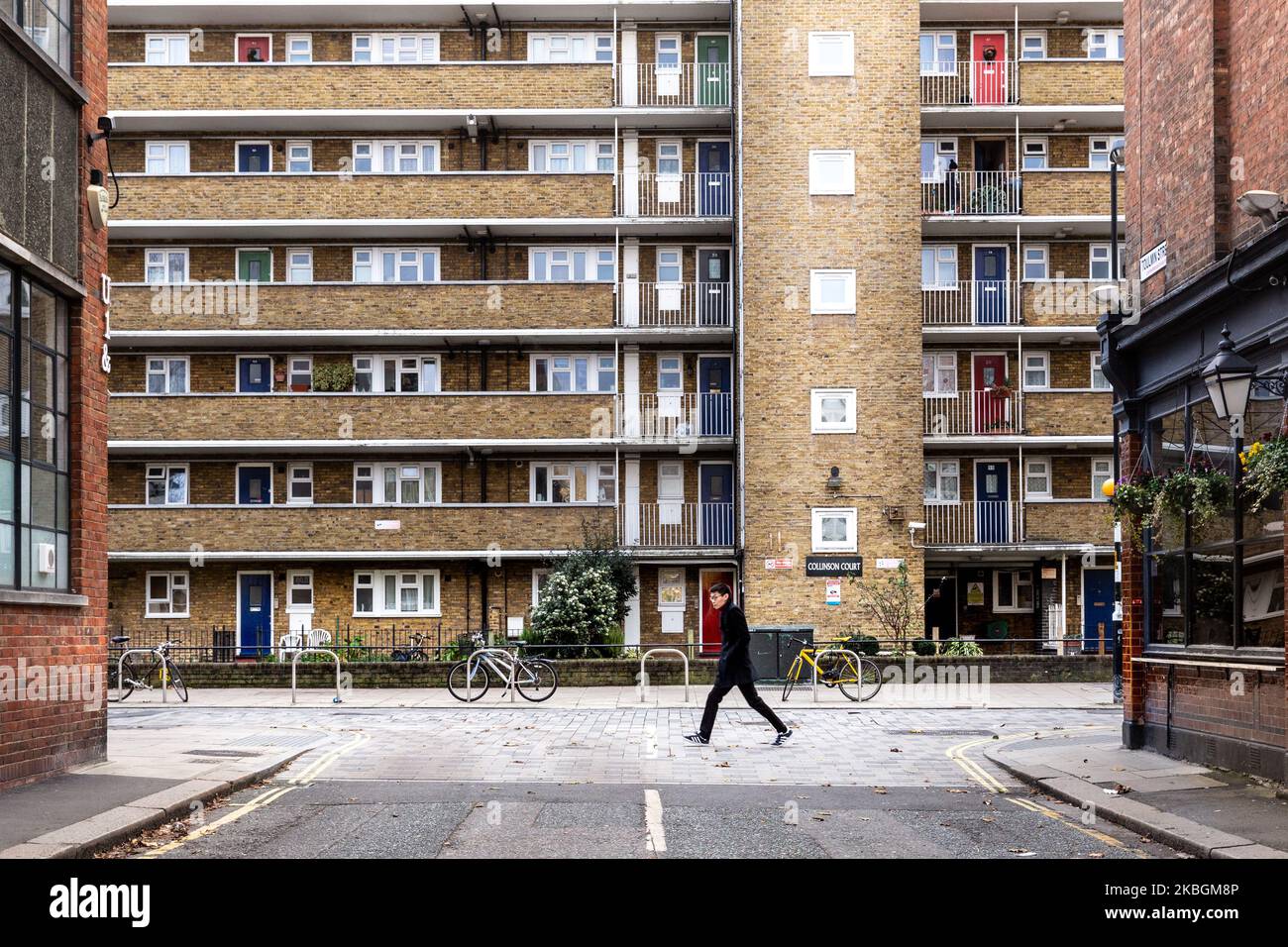 A man seen walking in front of a block of flats in Southbank district ...