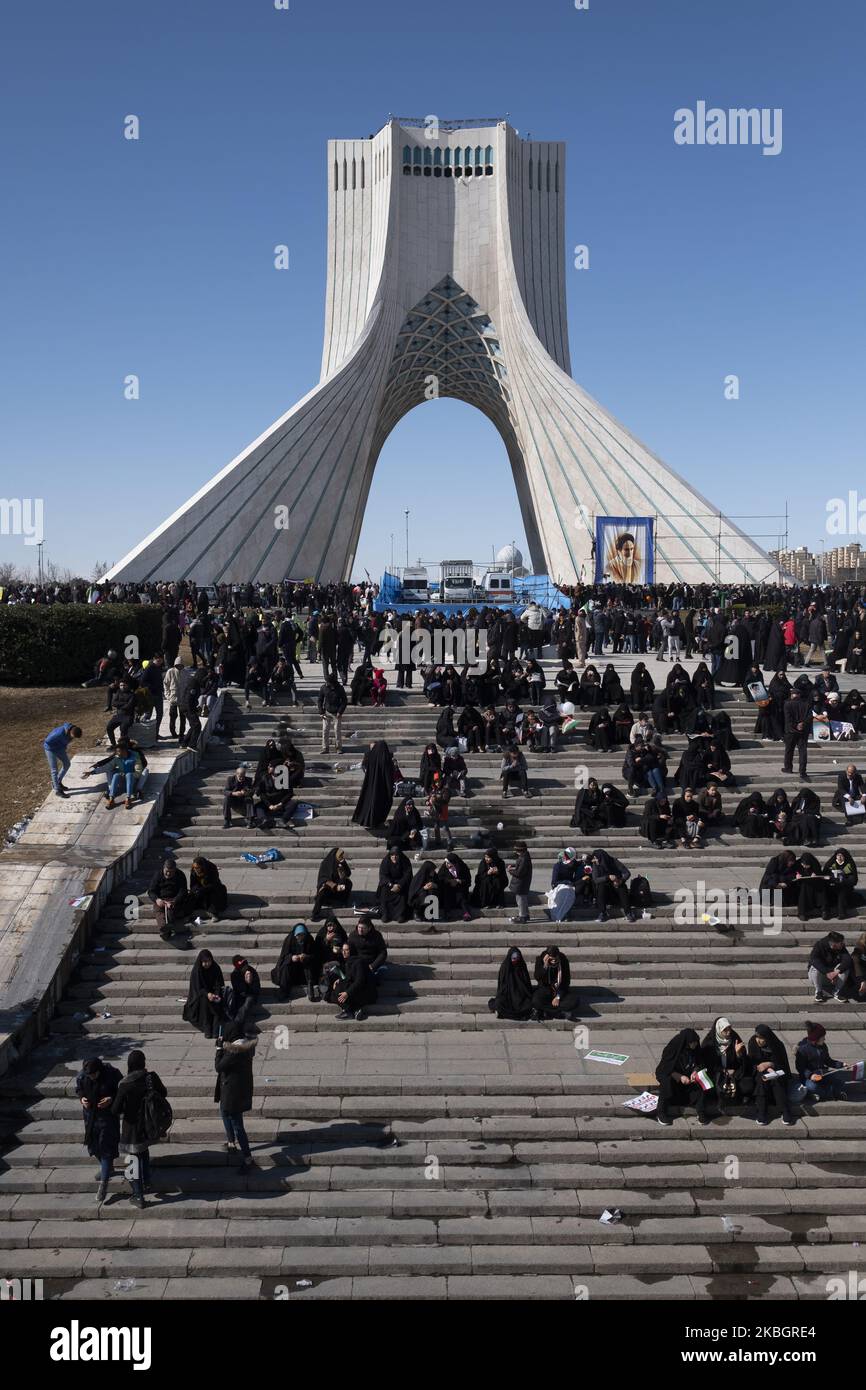 Iranians take part a rally to mark the Islamic Revolution anniversary ...