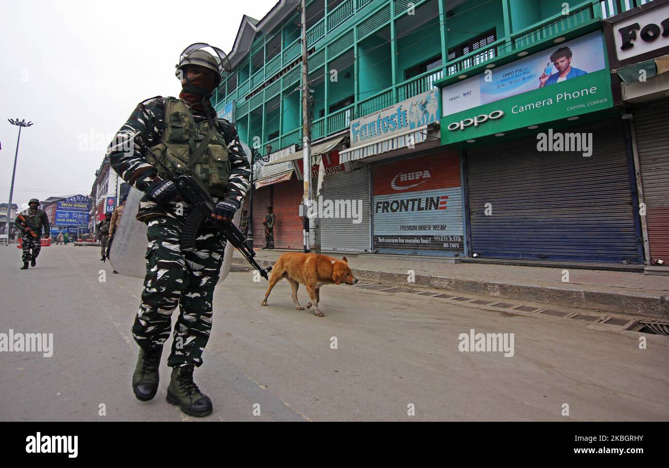 Indian paramilitary soldiers partolling during a shutdown in Srinagar ...