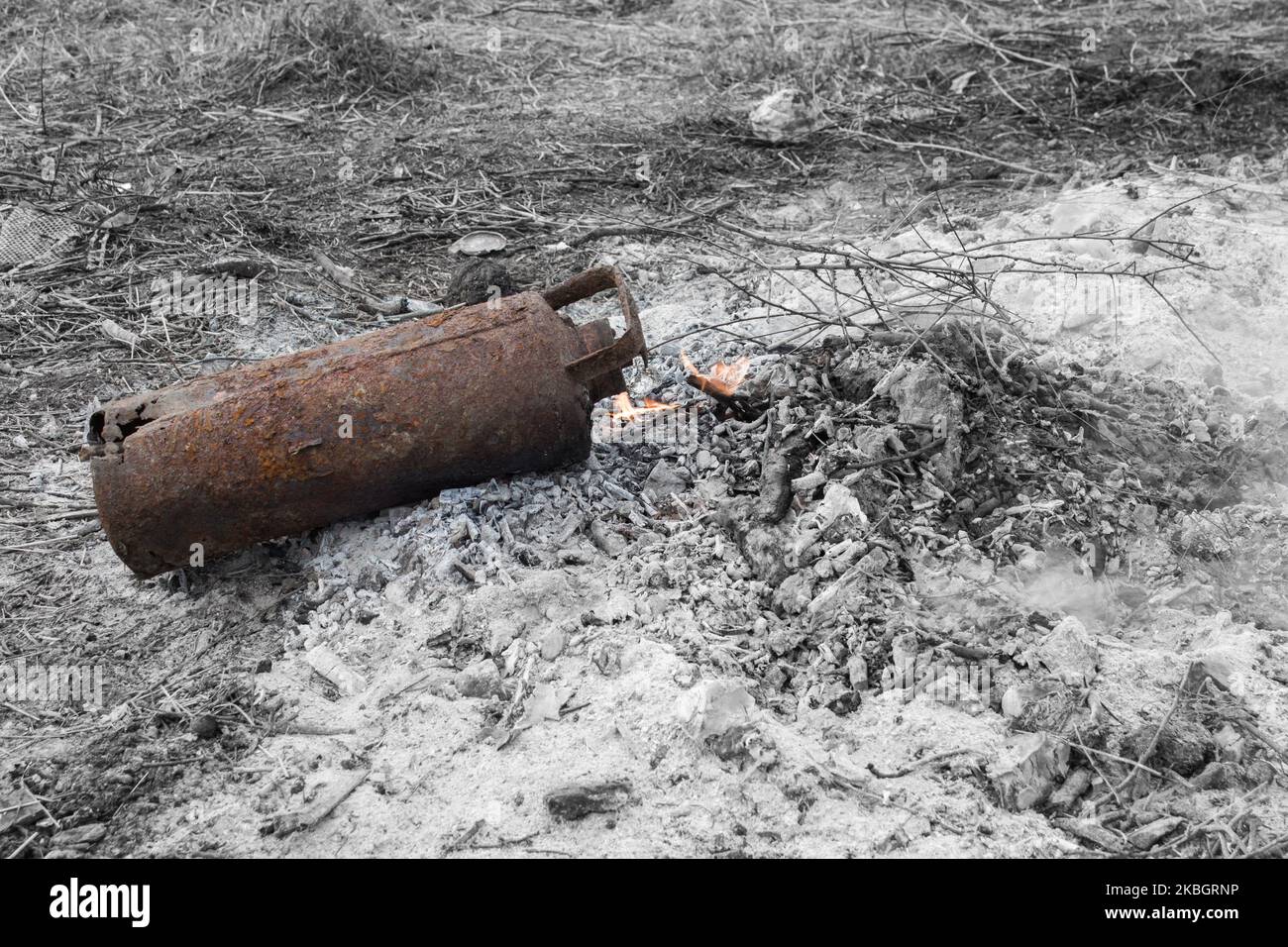 Old rusty fire extinguisher burns to ashes After the fire Stock Photo ...