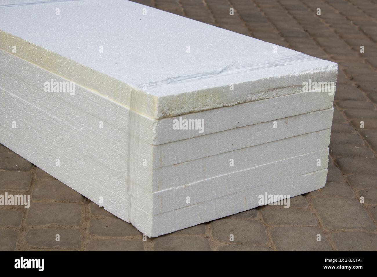 Polystyrene insulation boards background with copyspace and accented ...