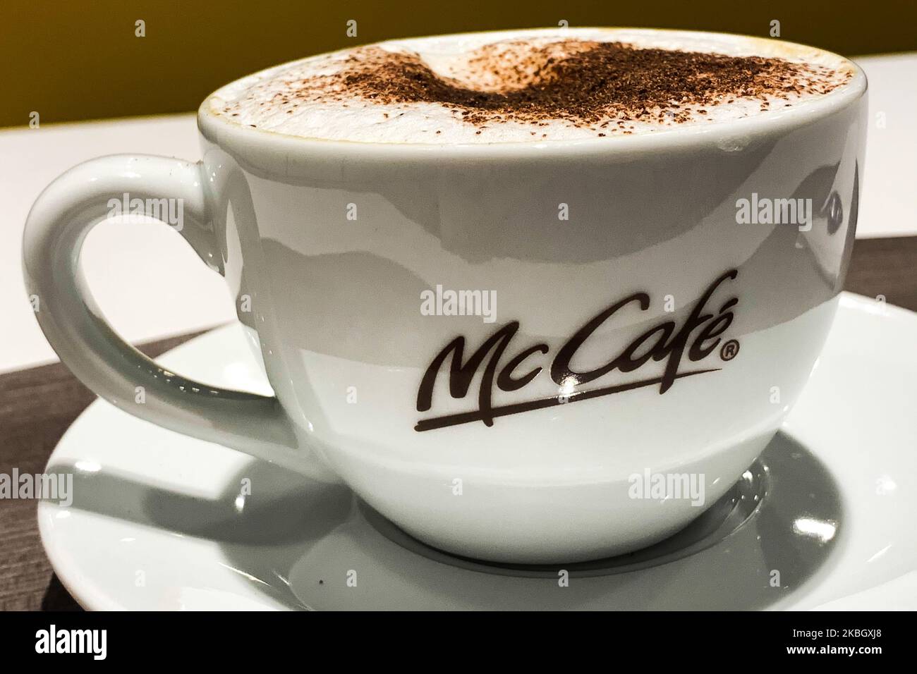 McCafe logo is seen on the cup of coffee in the McDonald's in ...