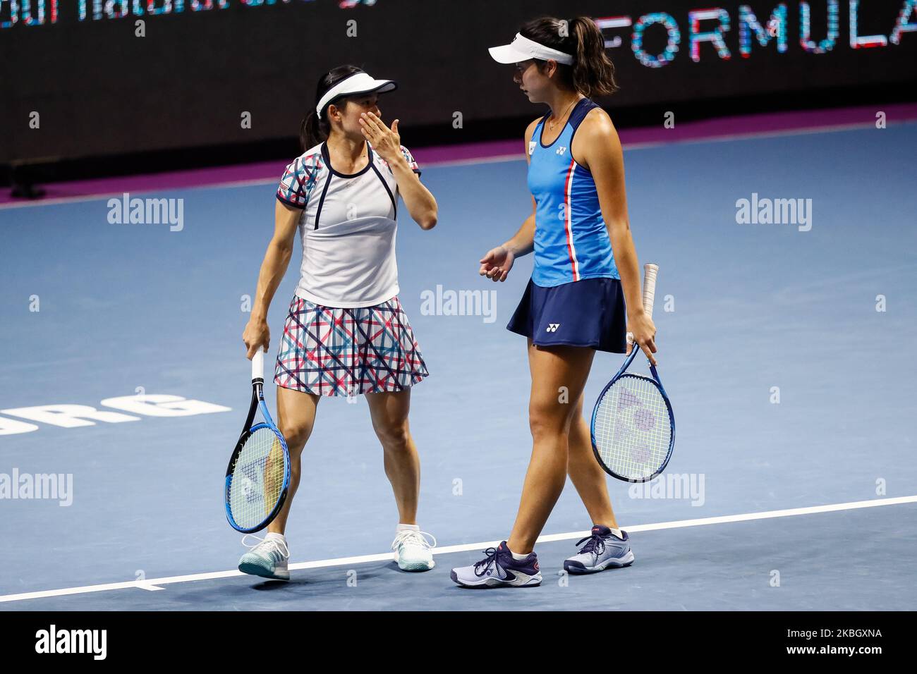 Japan couple Shuko Ayoama (L) and Ena Shibahara (R) in action against ...