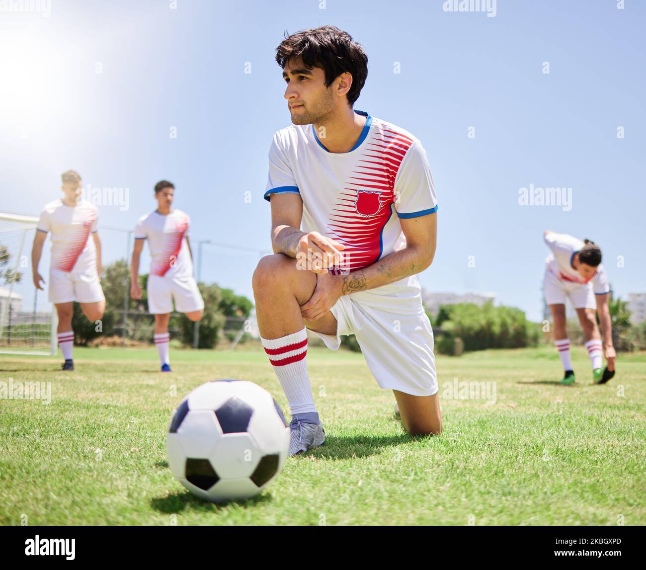 Sports, team and soccer training, stretching and warm up before game ...