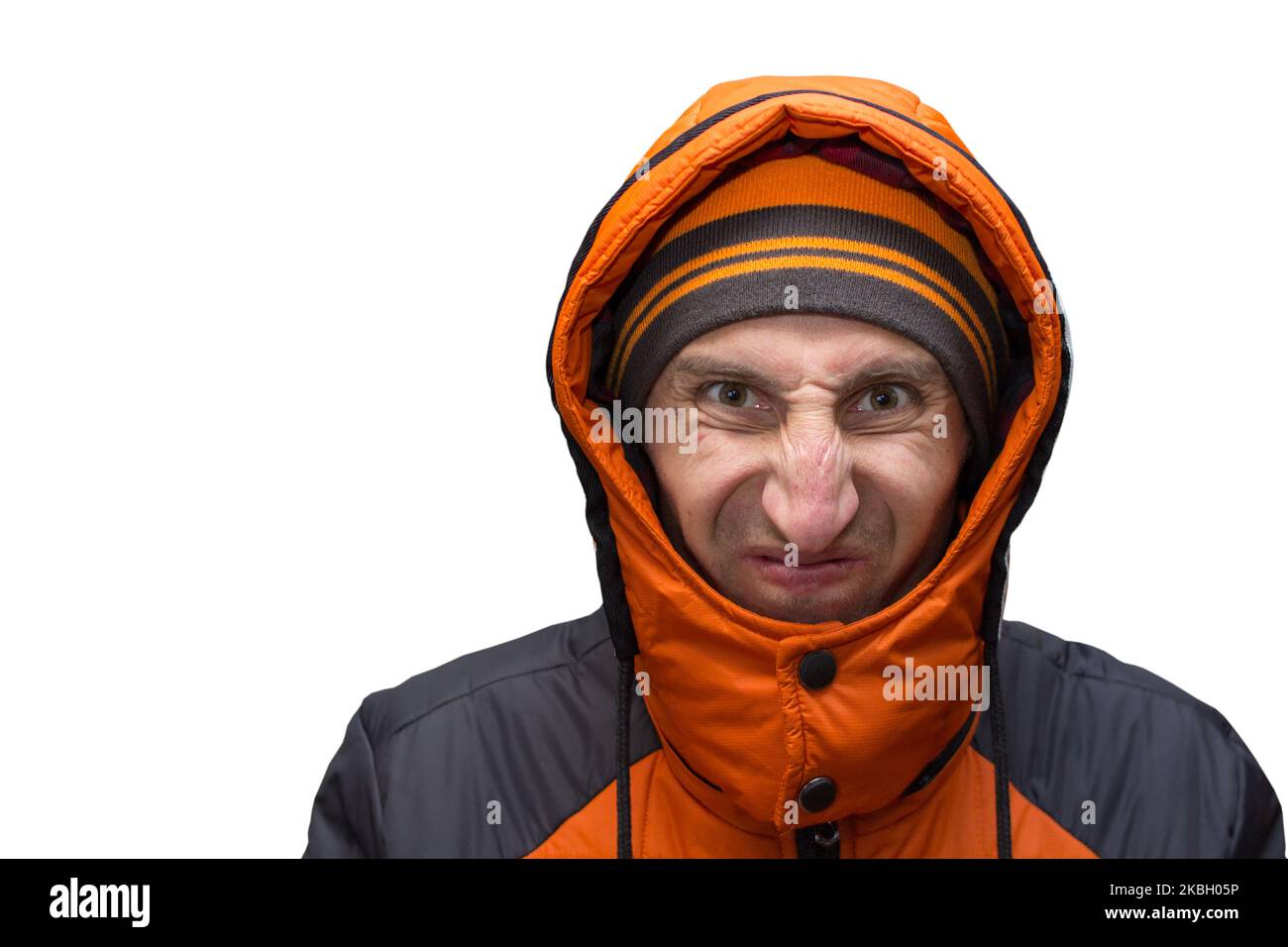 An angry man in an orange smoker on a white background Stock Photo - Alamy