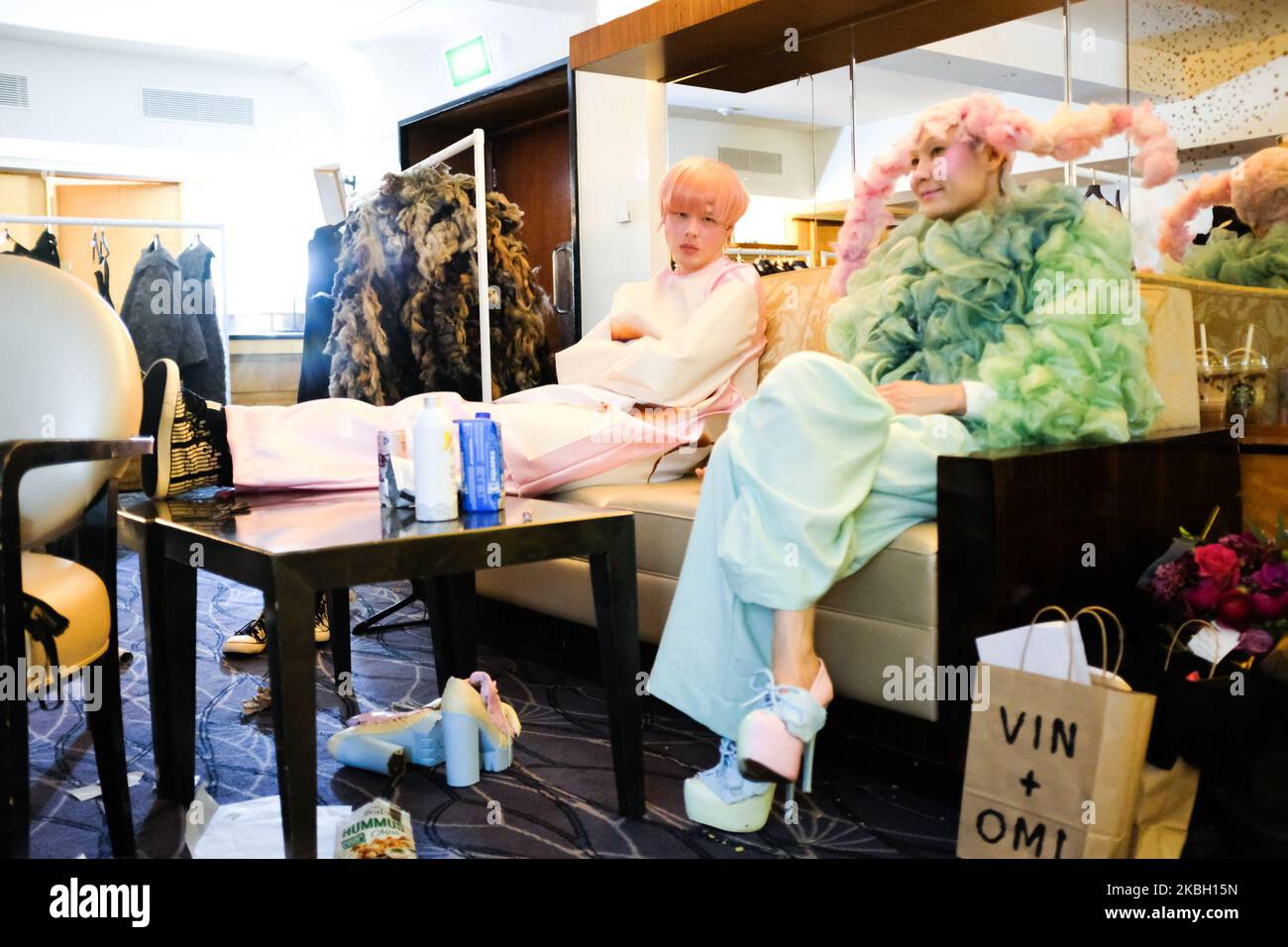 A model backstage at the VIN + OMI show during London Fashion Week at ...