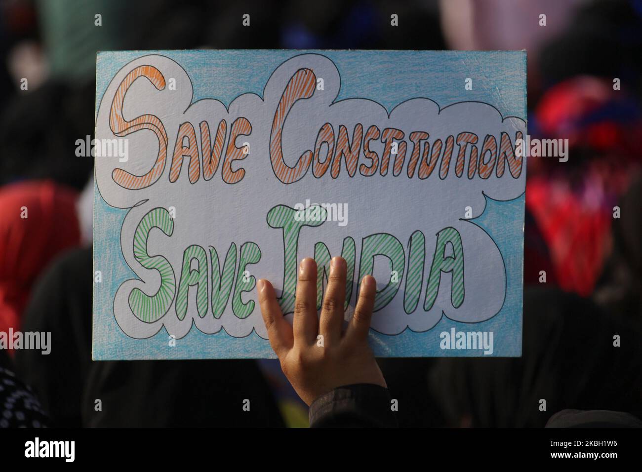Mumbai child placard hi-res stock photography and images - Alamy