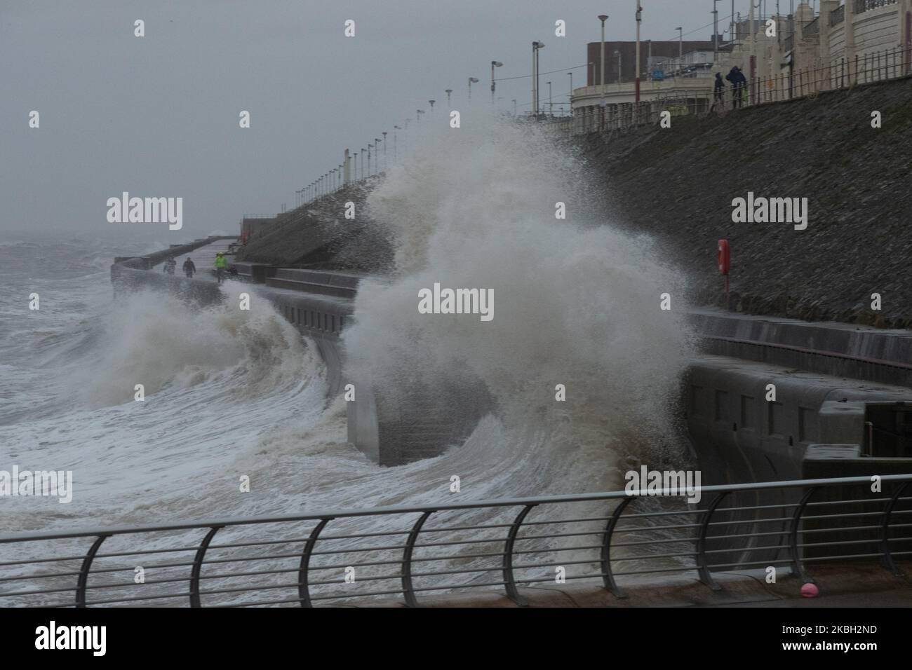 Waves crash against the promenade wall at Blackpool, United Kingdom, on ...