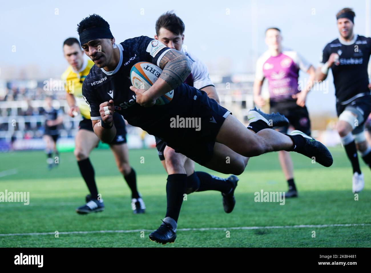 Sinoti Sinoti of Newcastle Falcons in mid air to score during the ...