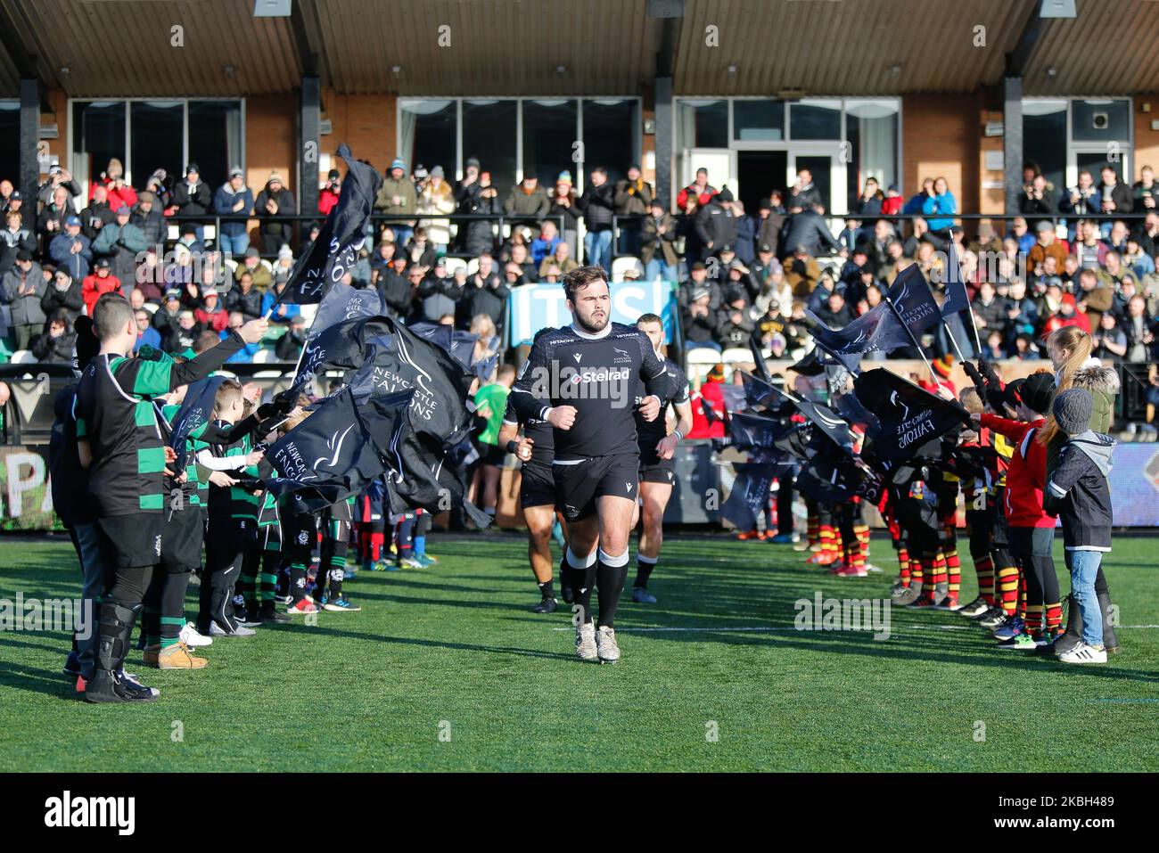 George McGuigan of Newcastle Falcons leads his side out for the Greene ...