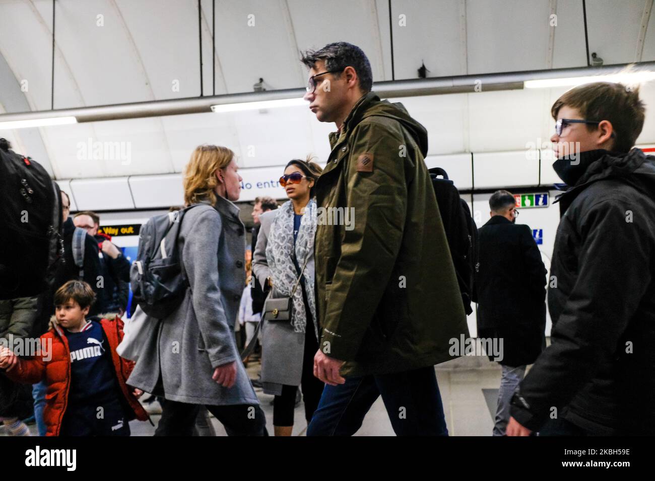 People are seen as they commute at Holborn Station, London on February ...