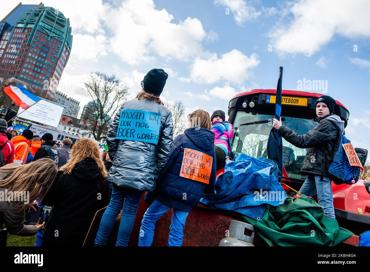 A group of children are wearing placards on their clothes, during the ...