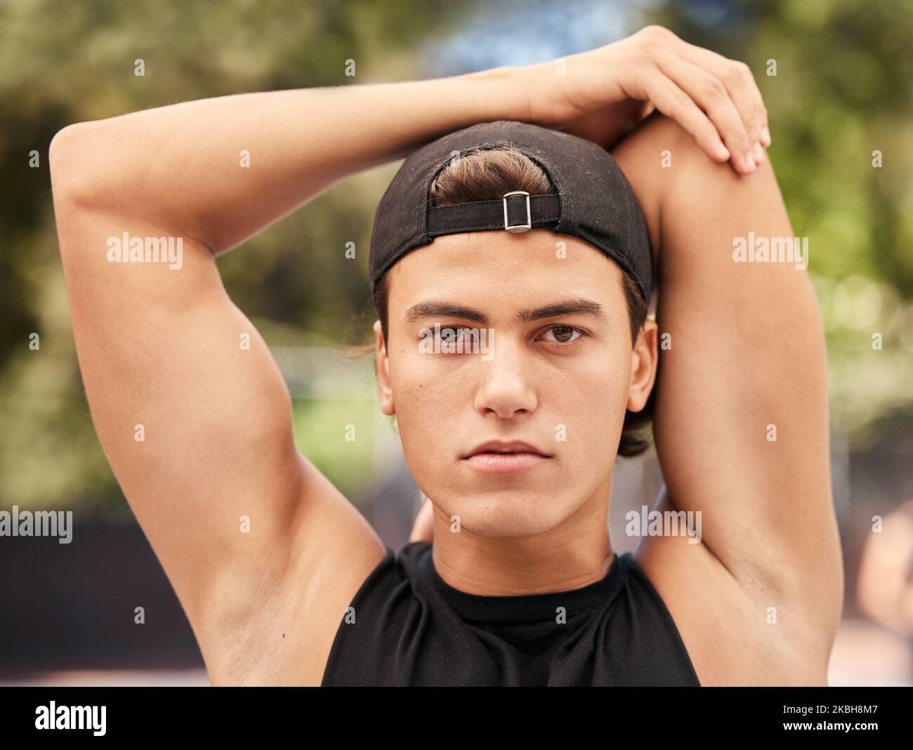 Young man stretching during exercise hi-res stock photography and ...