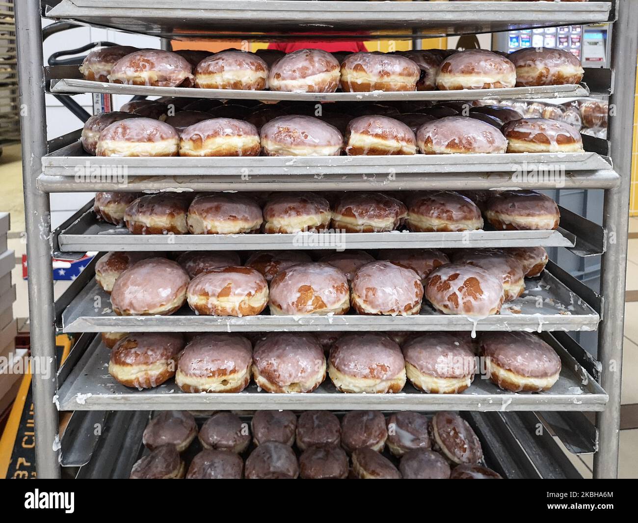 Paczki - traditional fist-sized donut filled with rose marmalade are ...