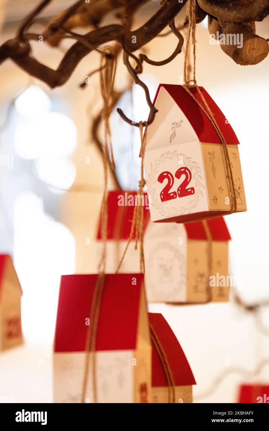 Advent calendar consisting of handmade little houses with the 22 in ...