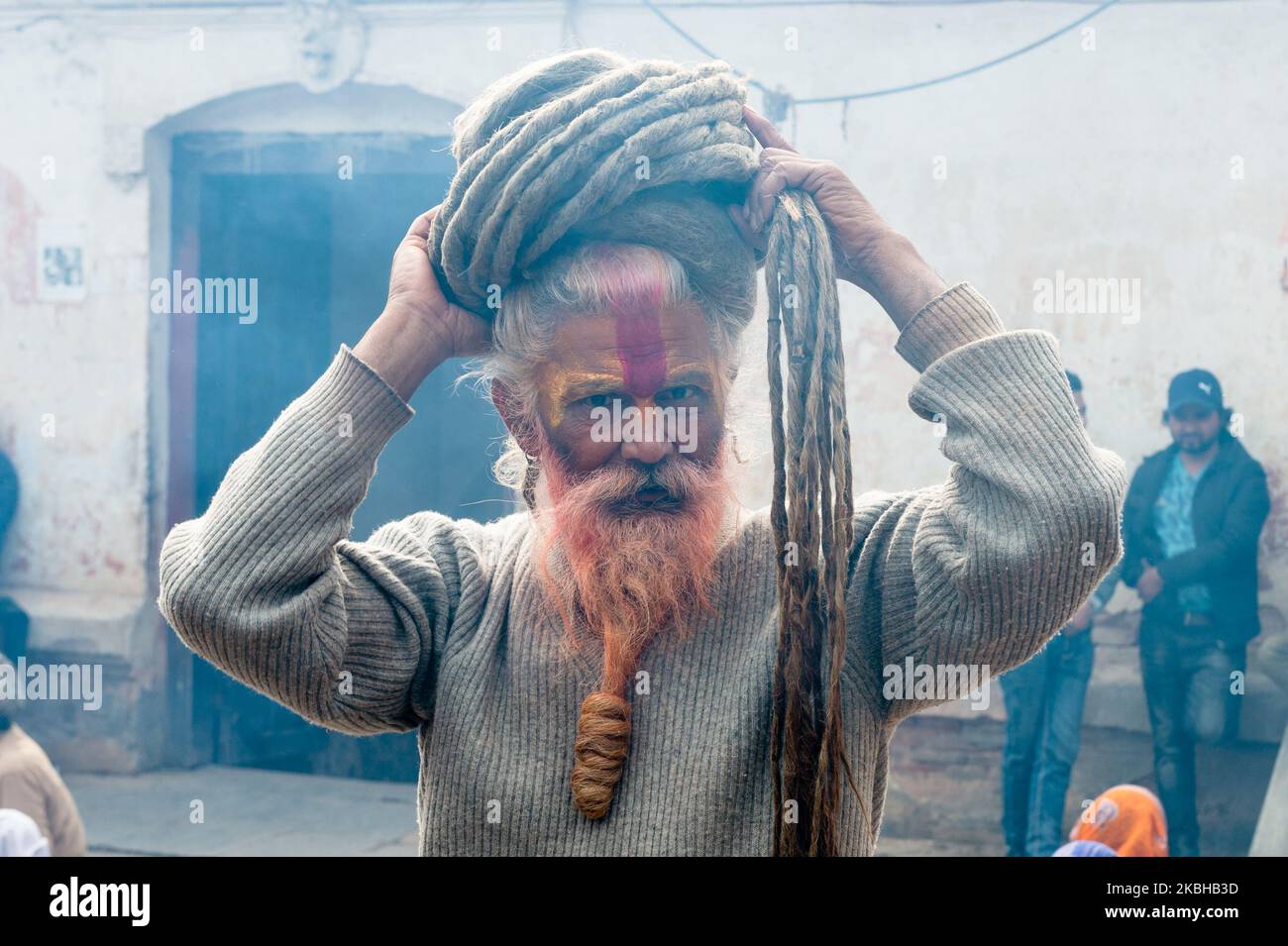 Hindu holy man (sadhu) wraps his dreadlocks at the Pashupatinath Temple ...