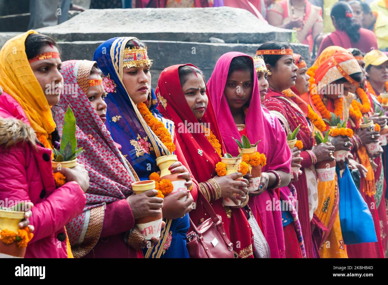 Hindu devotees perform rituals by the Bagmati river at the ...
