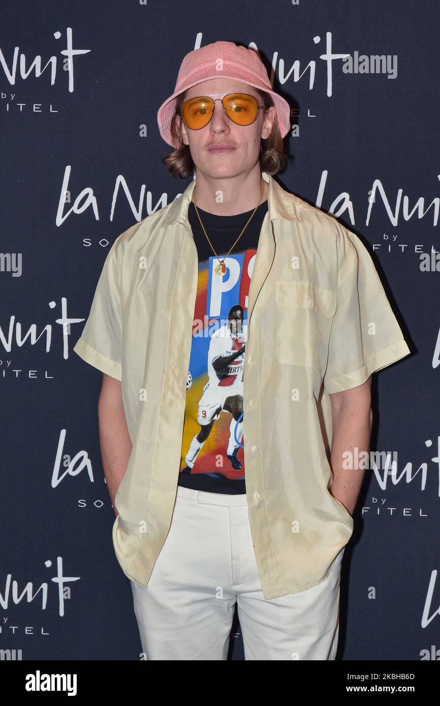 DJ Mosey poses for photos during the black carpet of the Opening of La ...
