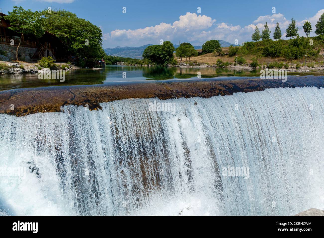 Big and fast river turning into waterfall in Podgorica. Landscapes ...