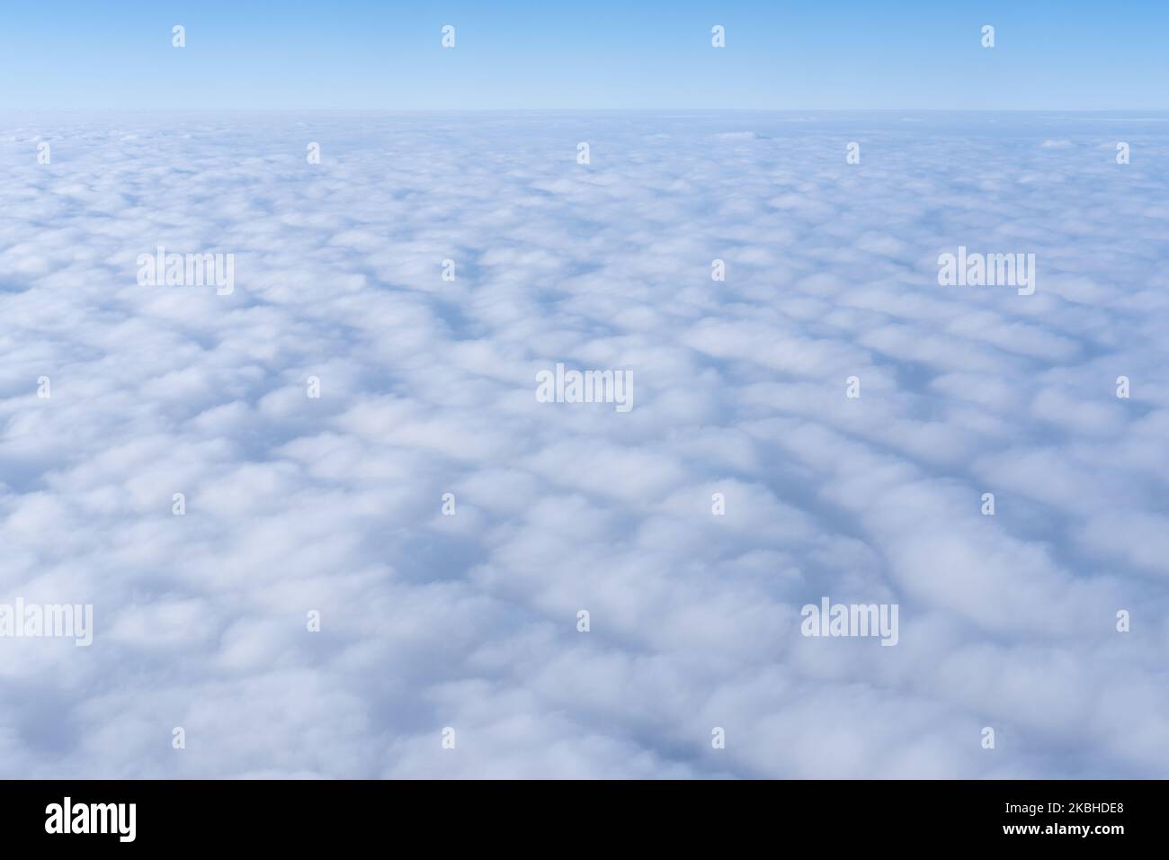 Background of a pink purple heavenly sky with fluffy dense clouds, top ...