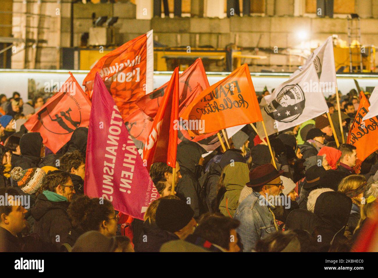 the flags are seen during the gathering against terror attack in Hanau ...