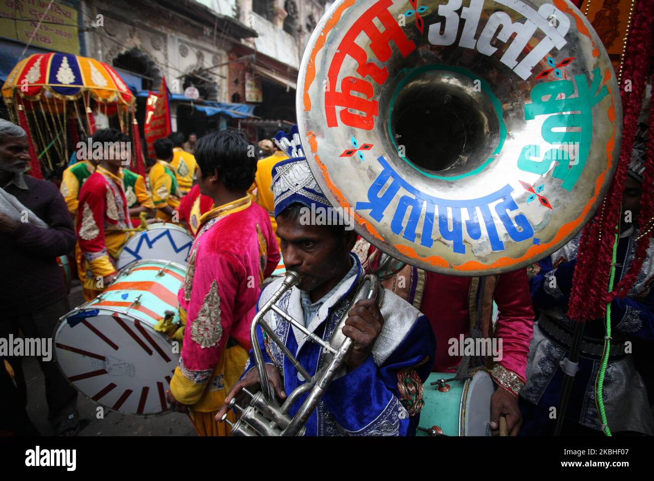 musicians of a local brass band company play music during the ...