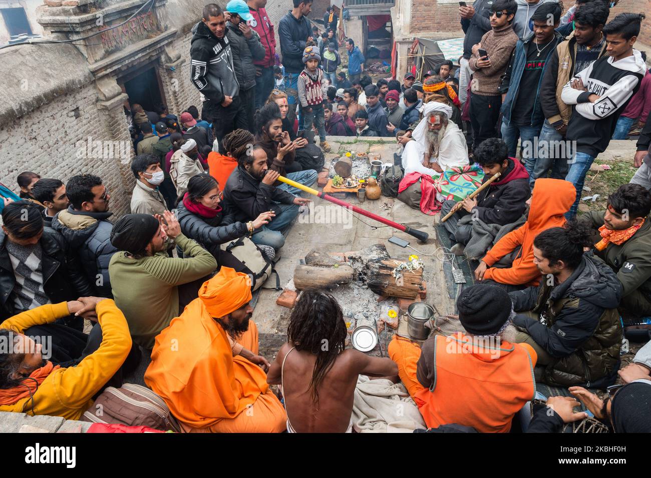 Hindu holy men (sadhus) perform rituals at the Pashupatinath temple ...