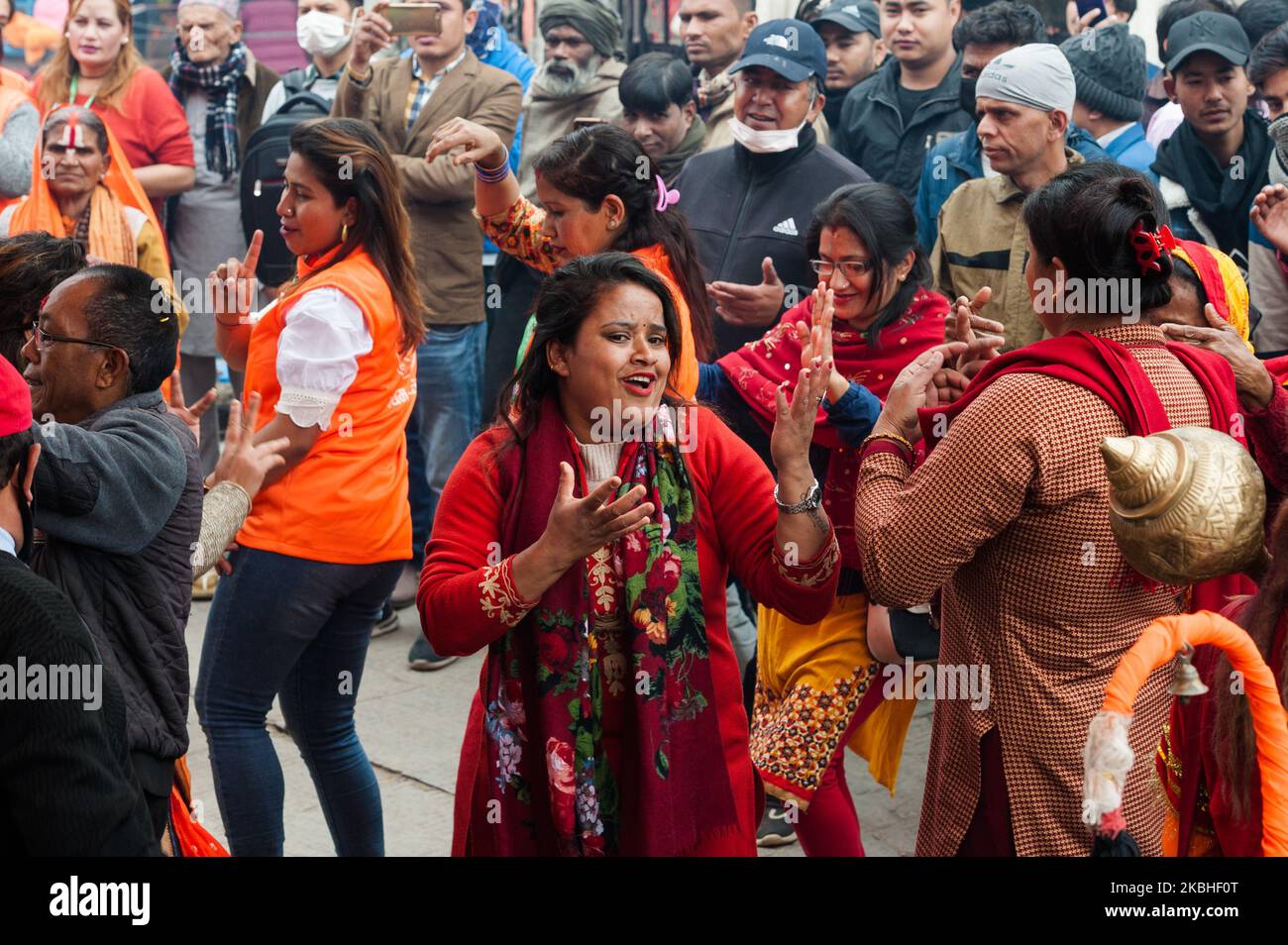 Hindu devotees dance at the Pashupatinath temple complex, one of the ...