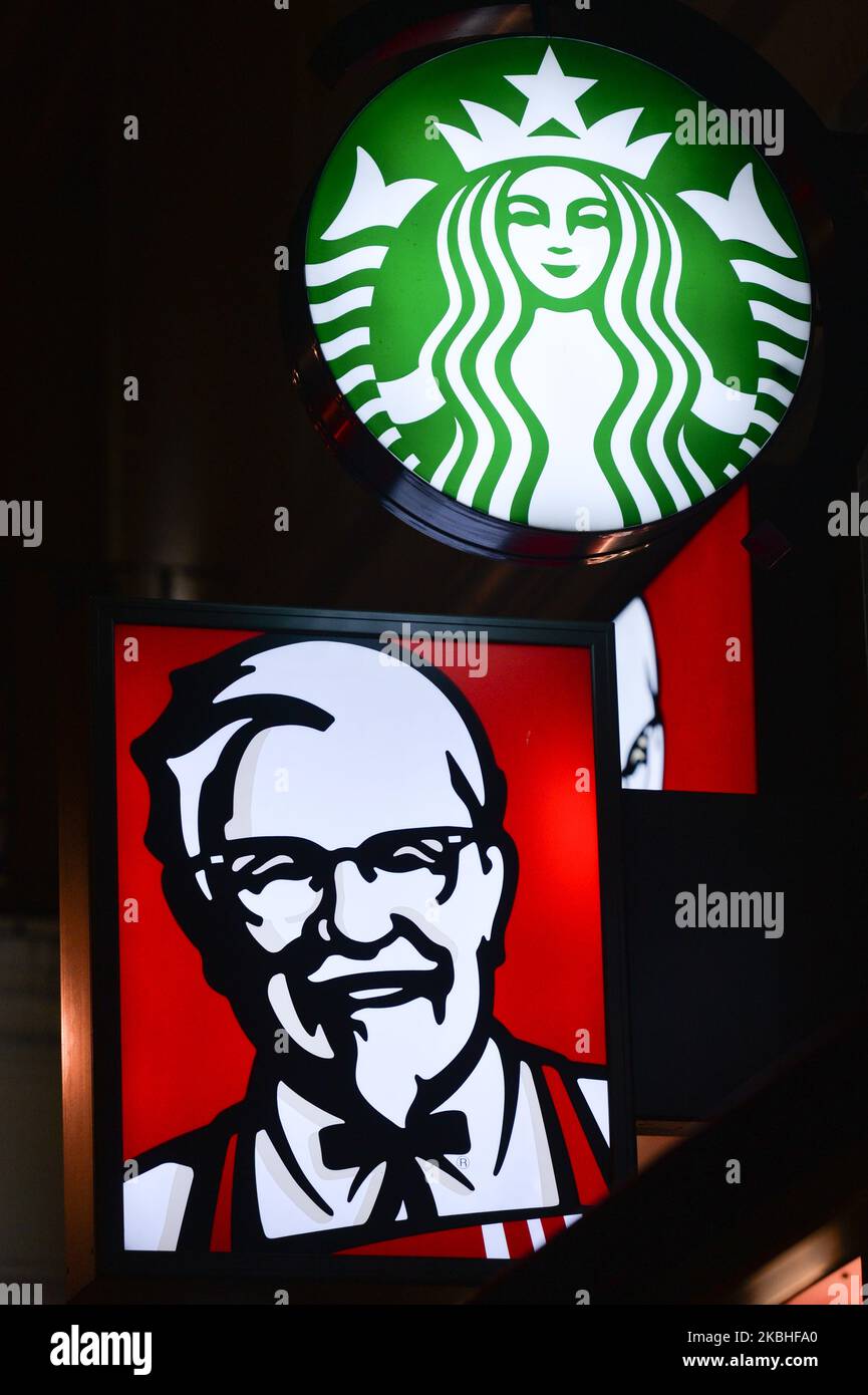 Starbucks Coffee company logo and KFC logo seen in Central London. On ...