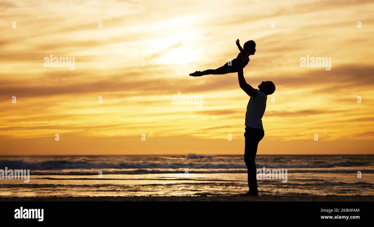 Man lifting child silhouette hi-res stock photography and images - Alamy