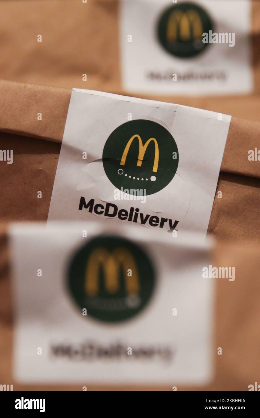 McDonald's McDelivery logo is seen on the food package in this ...