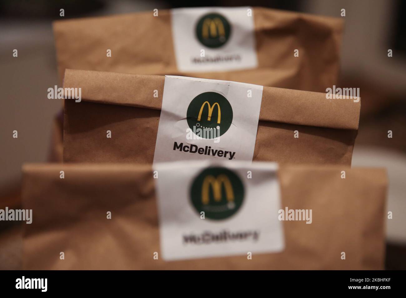 McDonald's McDelivery logo is seen on the food package in this ...