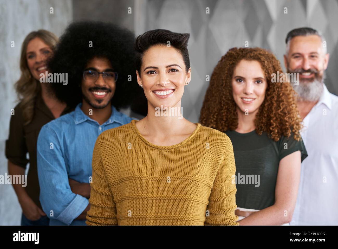 Nothing is achieved without teamwork. Cropped portrait of a group of ...