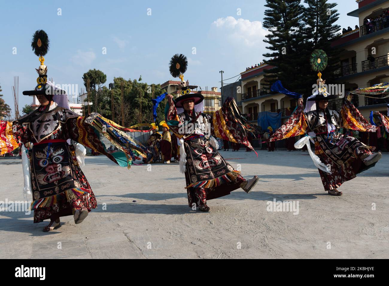 Tibetan monks in elaborate costumes perform the spiritual cham dance at ...