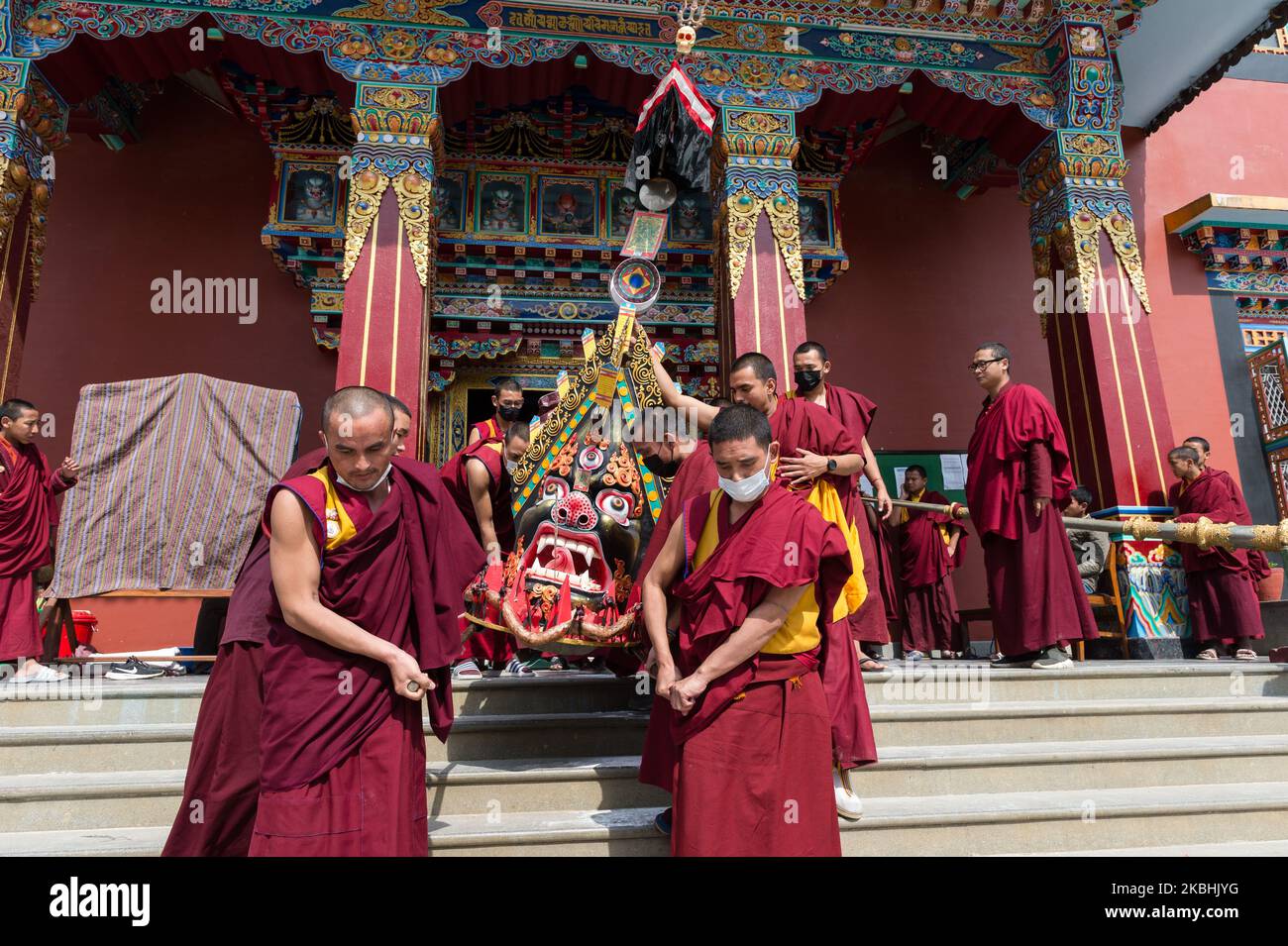 Tibetan monks carry a depiction of Yamanthaka - the god of death ...