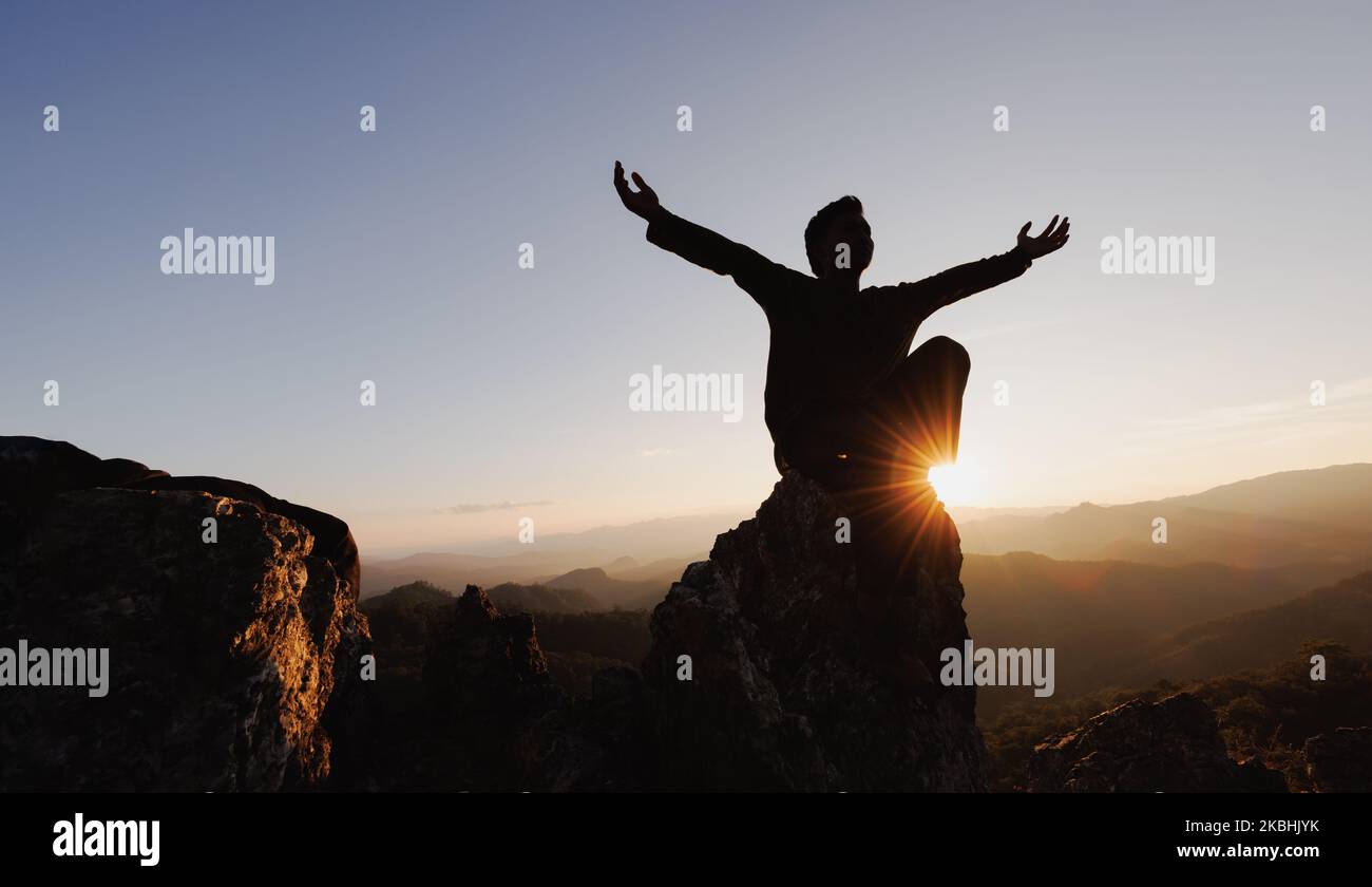 Silhouette of Human hands open palm up worship. Eucharist Therapy Bless ...