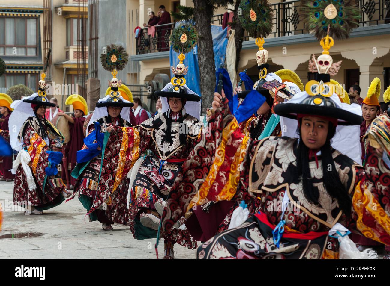Tibetan monks in elaborate costumes perform the spiritual cham dance at ...