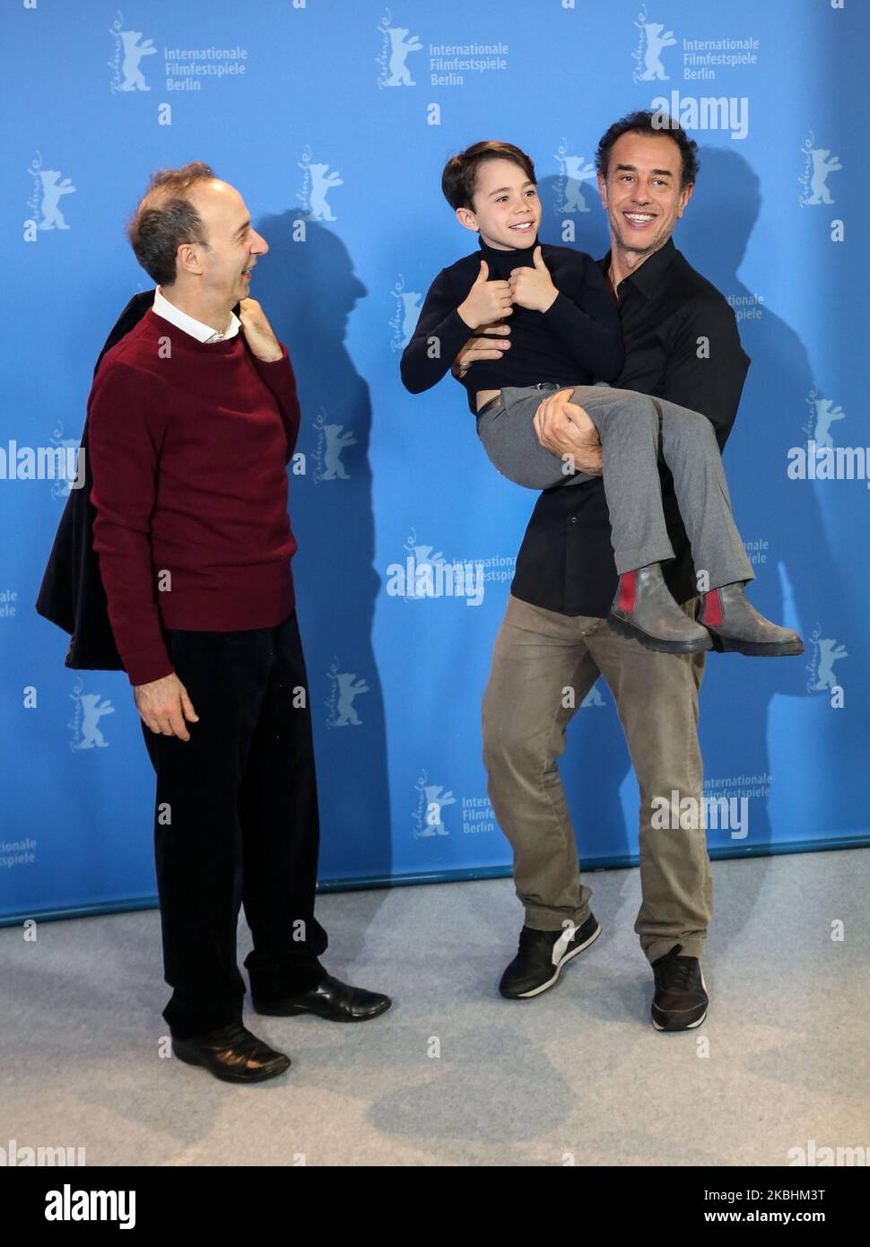 (L-R) Roberto Benigni, Federico Ielapi and Matteo Garrone pose at the ...