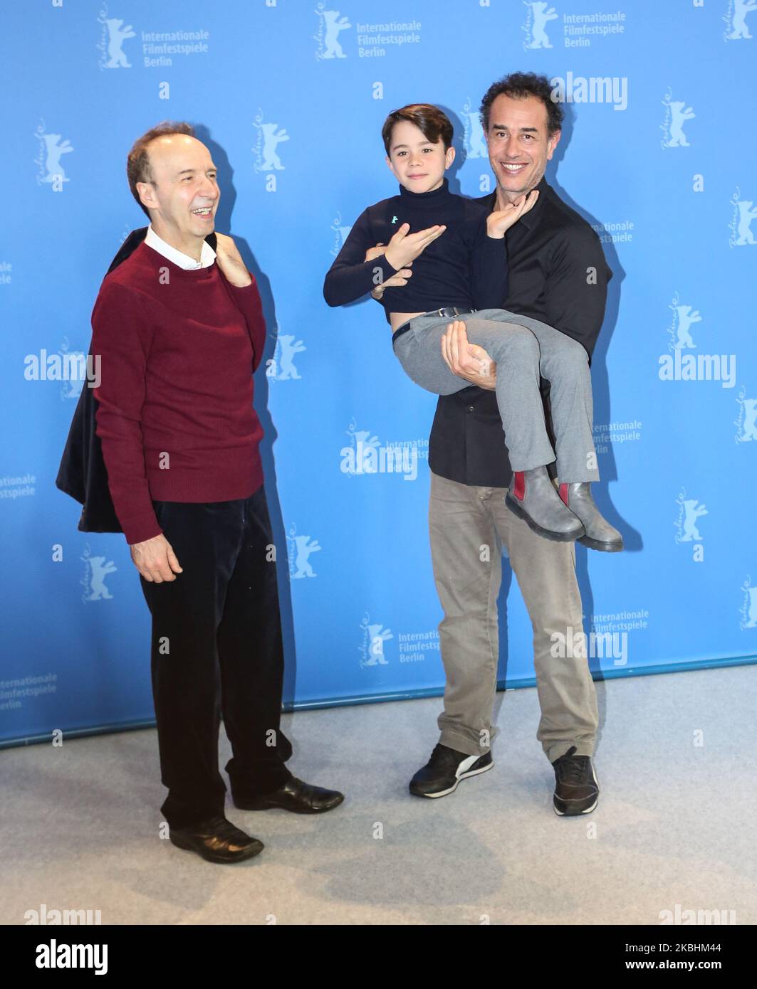 (L-R) Roberto Benigni, Federico Ielapi and Matteo Garrone pose at the ...