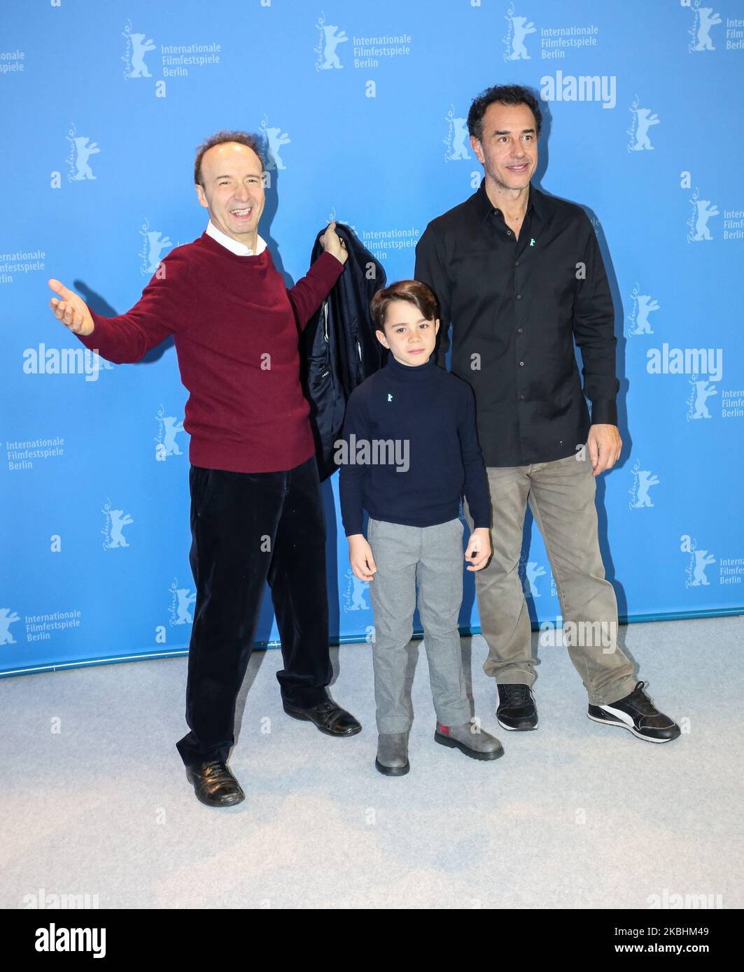(L-R) Roberto Benigni, Federico Ielapi and Matteo Garrone pose at the ...