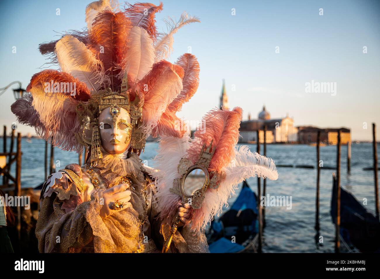 People wearing Carnival costume poses near the Saint Mark's square in ...