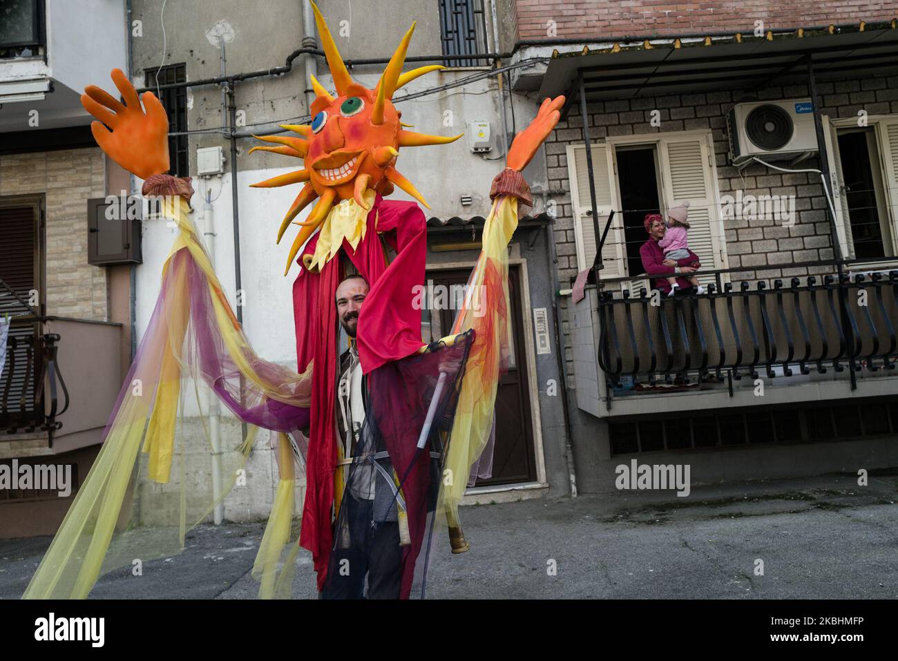 People dressed in traditional carnival costumes attend carnival ...