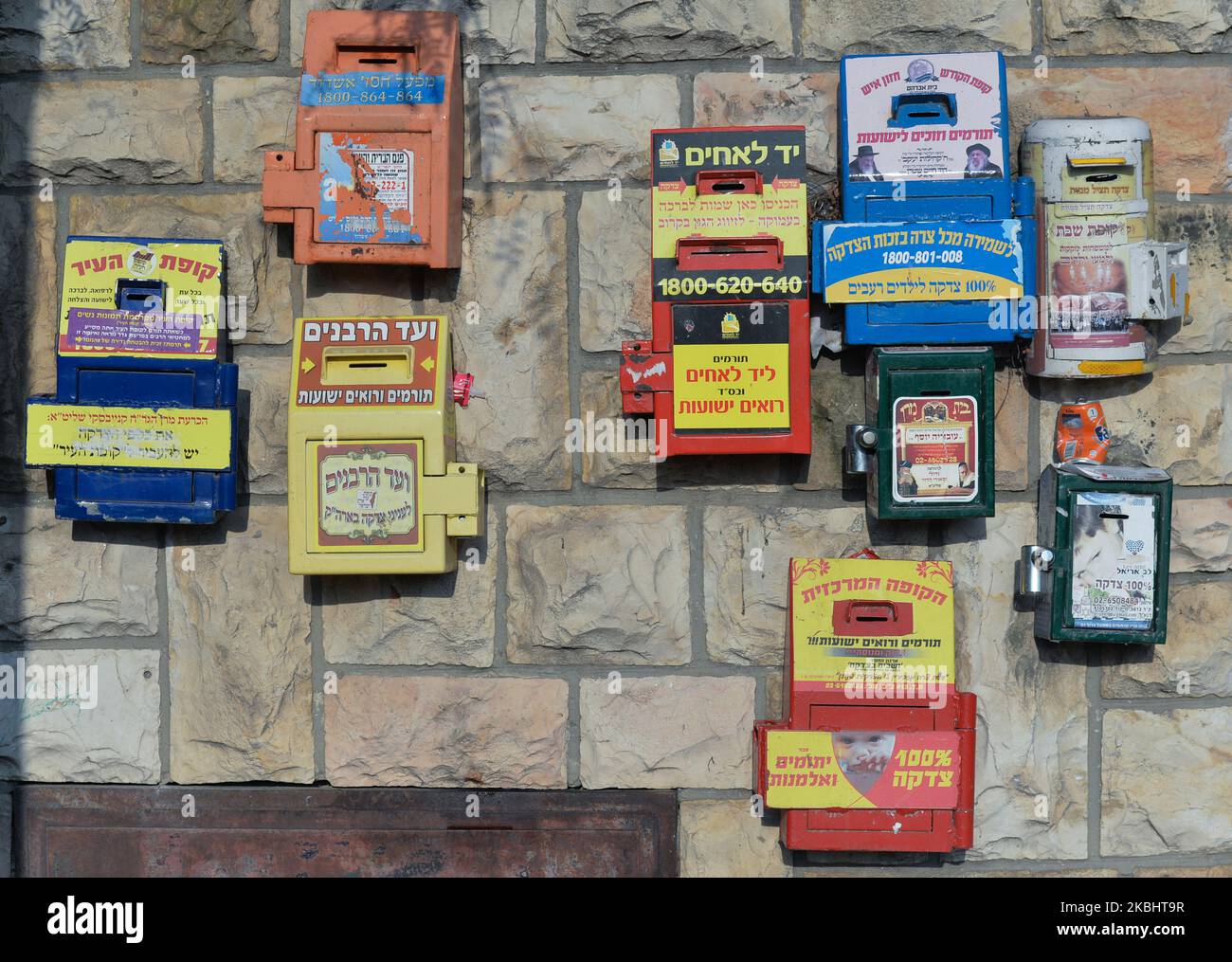 A view of of different charities collection boxes seen along Yirmiyahu ...