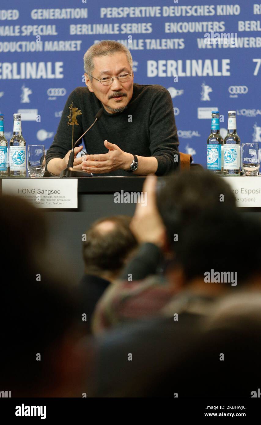 (L-R) South Korean director Hong Sangsoo attends the "The Woman Who Ran ...