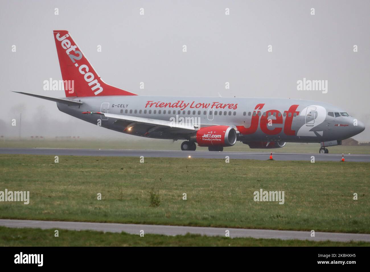 Jet2 Boeing 737-300 (QC) aircraft as seen landing during weather with ...