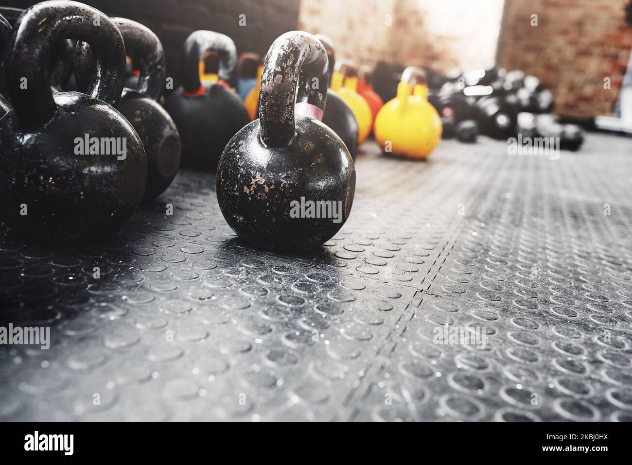 Muscles are sculpted with these. Still life shot of weights in a gym ...