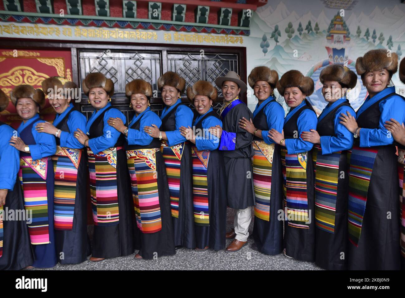 Nepalese People from Sherpa community in a traditional attires pose for ...