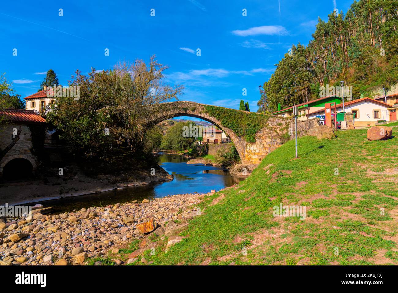 Lierganes Spain ancient roman bridge over River Miera in pretty village ...